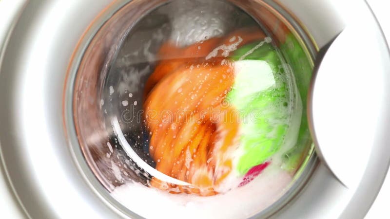 Washing Colored Laundry in the Washing Machine Stock Footage - Video of ...