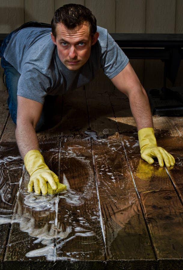 Washing the deck stock photo. Image of knees, adult, wooden - 30435572