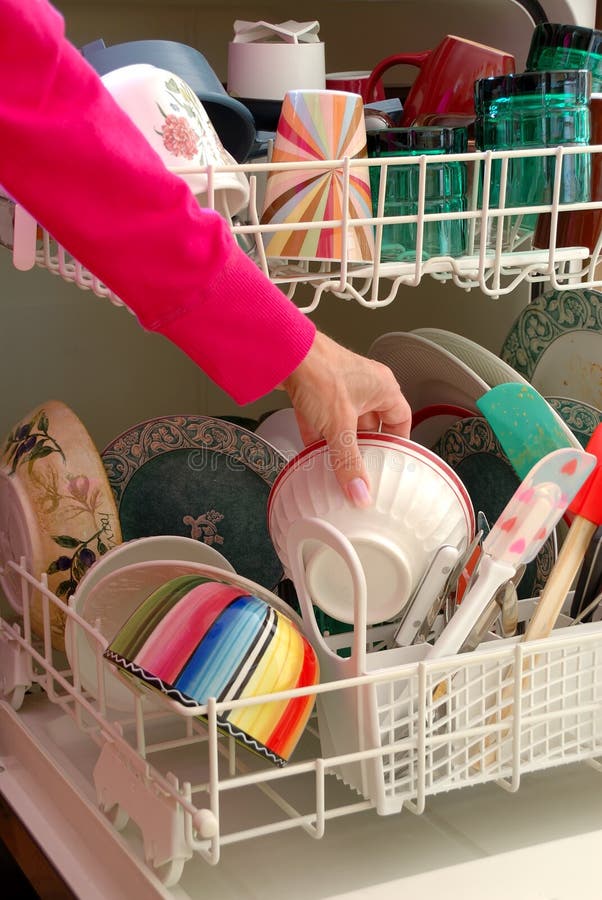 Washing Dishes stock photo. Image of bowls, female, loading - 1329886