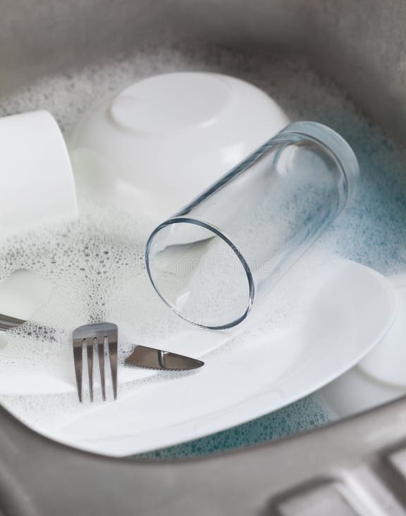 Washing the Dishes stock photo. Image of wash, sink, plates - 23488720