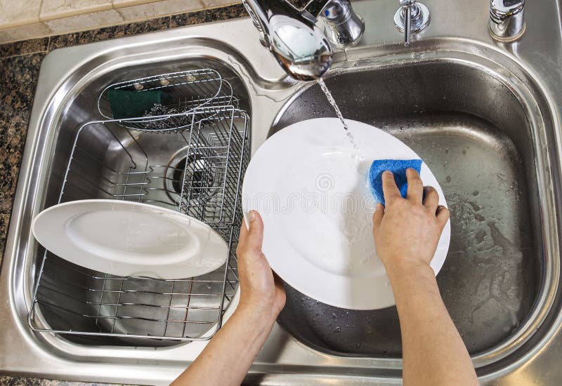 Washing Dishes stock image. Image of hand, home, metal - 25147609
