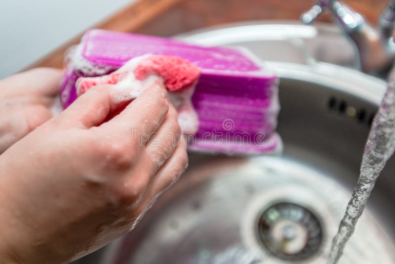 Washing the Dishes in the Kitchen Sink Stock Photo - Image of cleaning ...