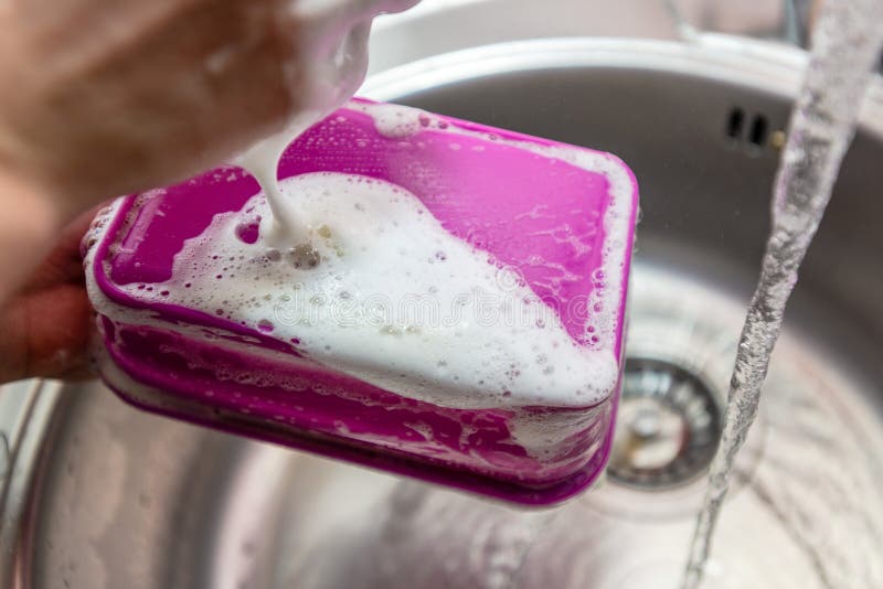 Washing the Dishes in the Kitchen Sink. Cleaning Work Stock Image ...