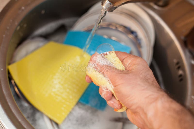 Hand Squeezes Soapy Solution Sponge Blue Rag Washing Dishes Kitchen ...
