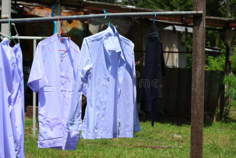 Washing and Drying Clothes in the Morning Sun Stock Photo - Image of ...