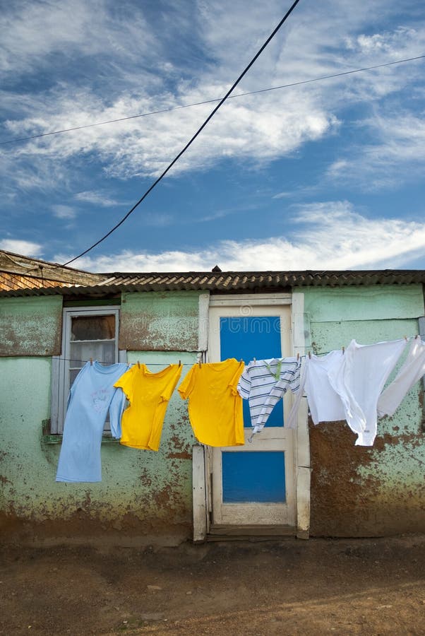 Washing Drying in Front of Shack Stock Image - Image of cabin, cyan ...
