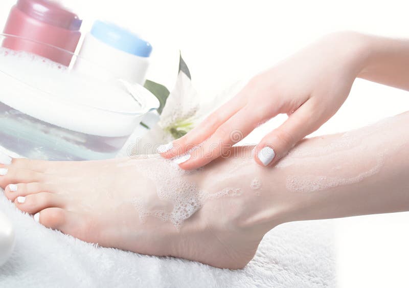 Washing of a female leg stock image. Image of detail, jars - 8739625