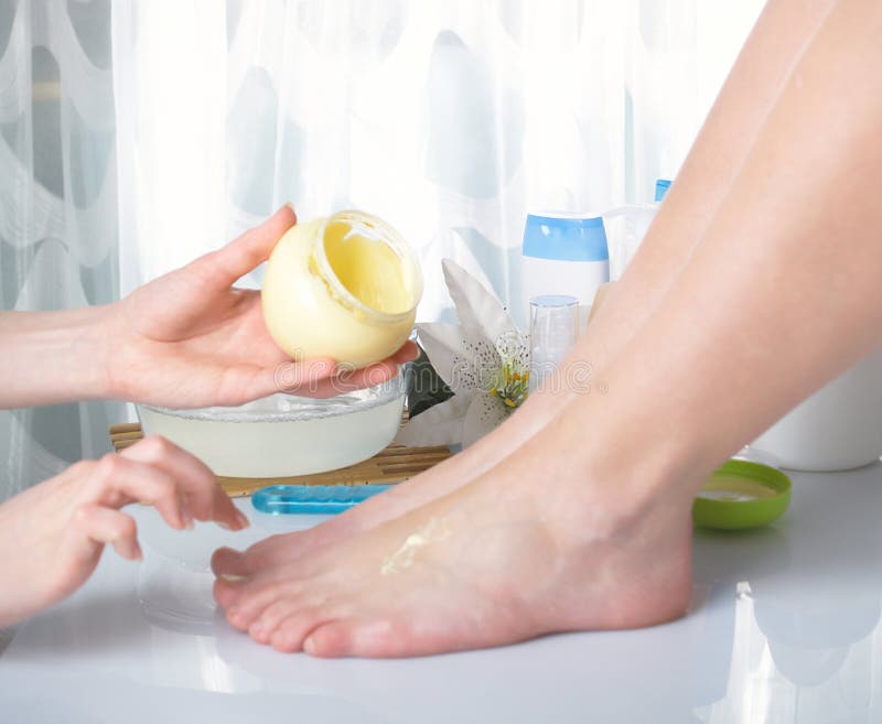 Washing of a female leg stock image. Image of detail, jars - 8739625
