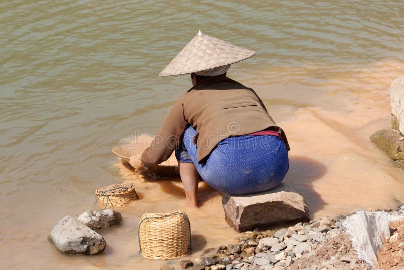Washing gold in the river stock photo. Image of wash - 13420404