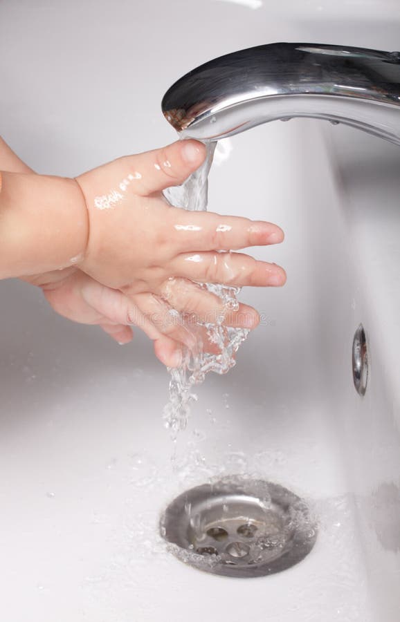 Baby washing hands stock image. Image of sink, closeup - 13404903