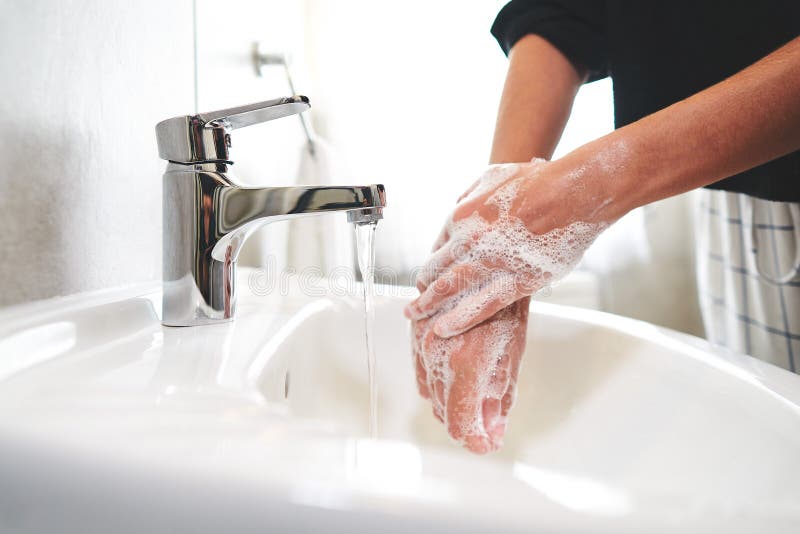 Washing hands in bathroom stock photo. Image of foam - 257121858