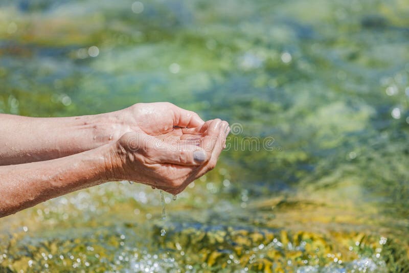 Washing Hands in Clear Water in a Stream Stock Image - Image of human ...