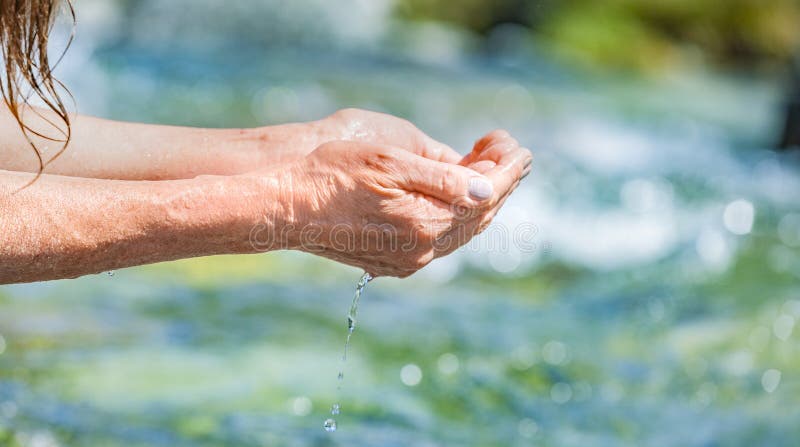Washing Hands in Clear Water in a Stream Stock Photo - Image of fresh ...
