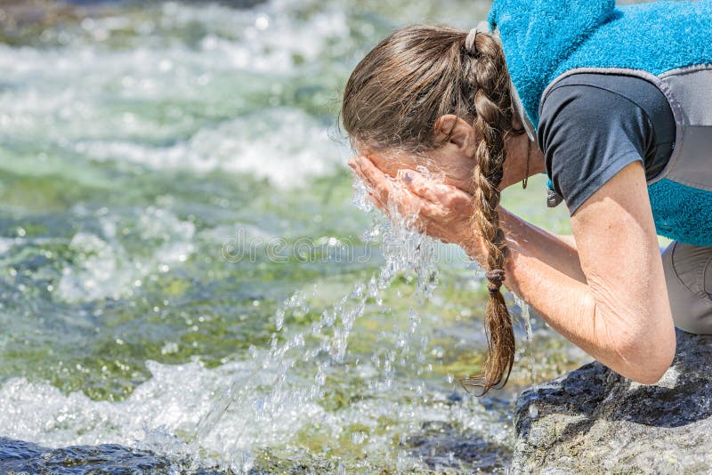 Washing Hands and Face in Clear Water Stock Image - Image of blue ...