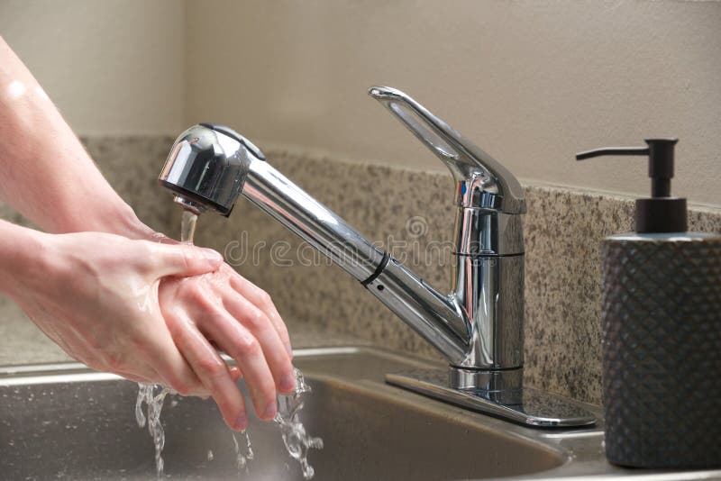 Washing Hands in the Kitchen Sink Stock Photo - Image of health, hands ...