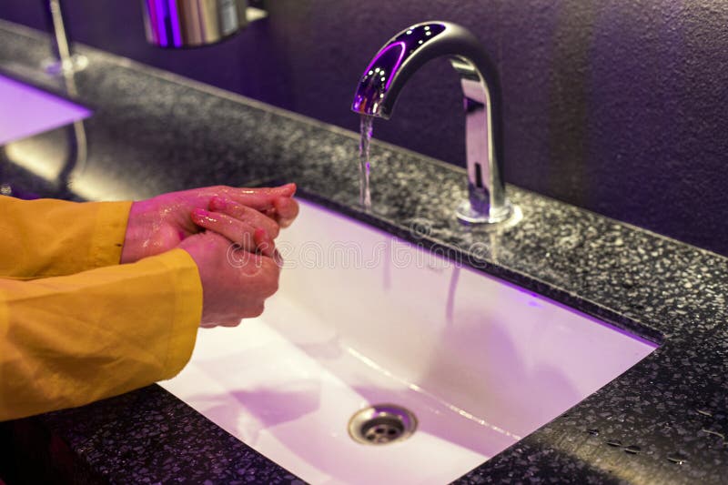 Washing Hands in a Modern Interior with Purple Stock Image - Image of ...