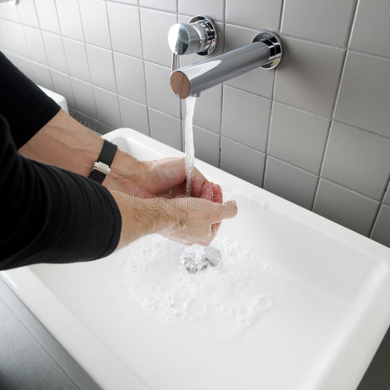 Washing his hands stock photo. Image of drain, household - 2244098