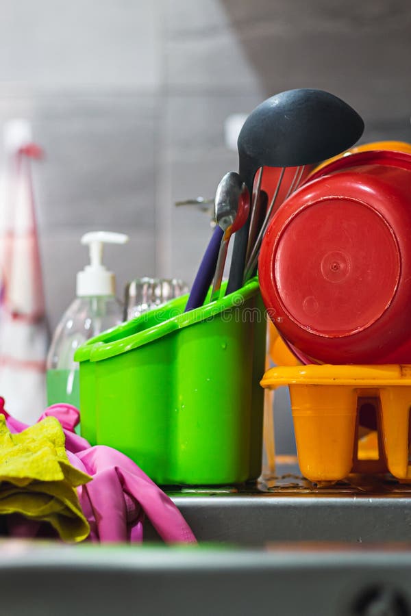 Washing kitchen utensils stock photo. Image of counter - 162619154