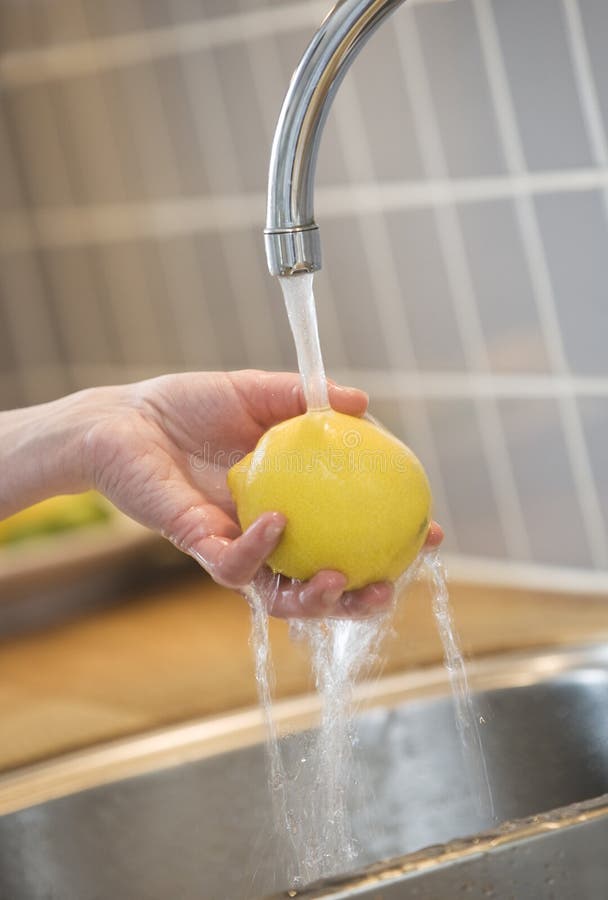 Washing Lemon stock photo. Image of kitchen, holding - 39587676