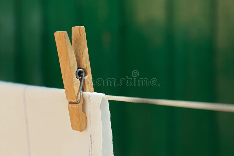 Washing Line with Clean Laundry and Clothespin Outdoors, Closeup Stock ...