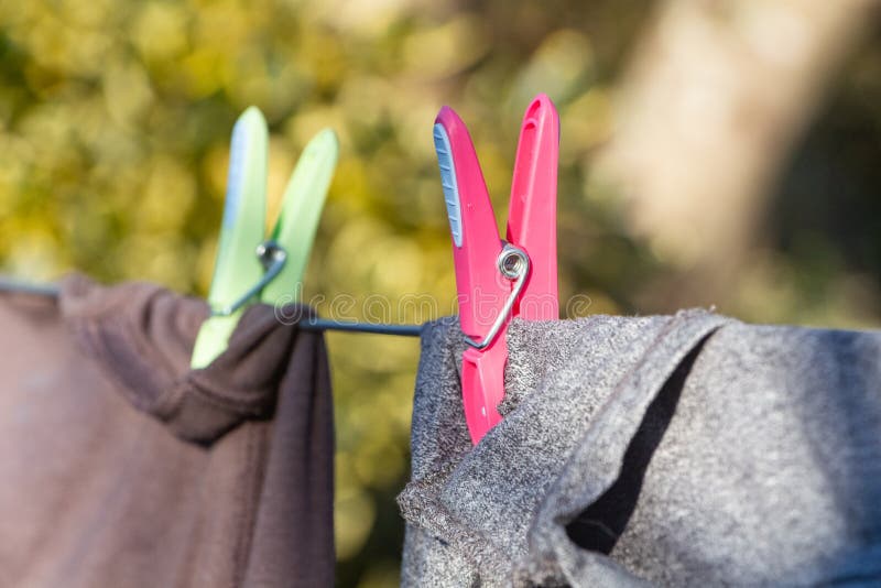 Washing line with clothes stock photo. Image of clothes - 153325232