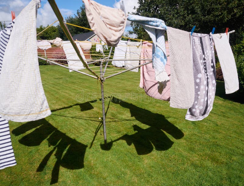 Washing line with clothes stock photo. Image of warm - 59164468