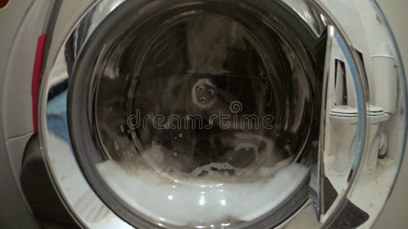 Washing Machine during Filling with Soap Foam at Home Stock Video ...