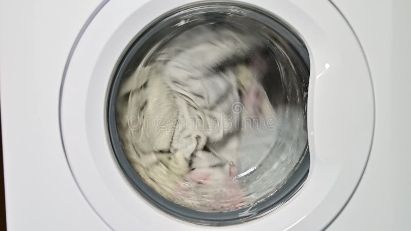 Out of Focus, the Door Opens and an Unrecognizable Woman Comes Out of ...