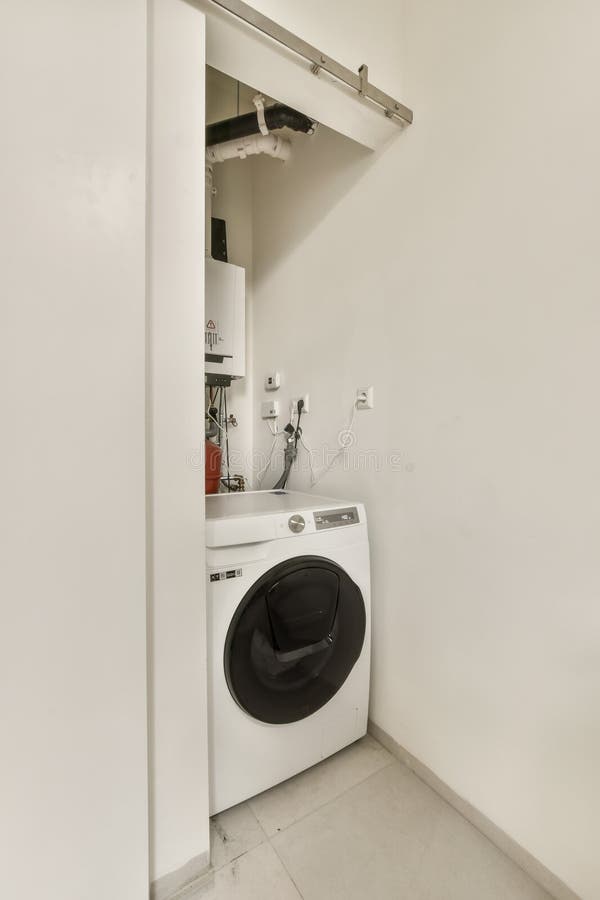 A Washing Machine and Dryer in a Laundry Room Stock Image - Image of ...