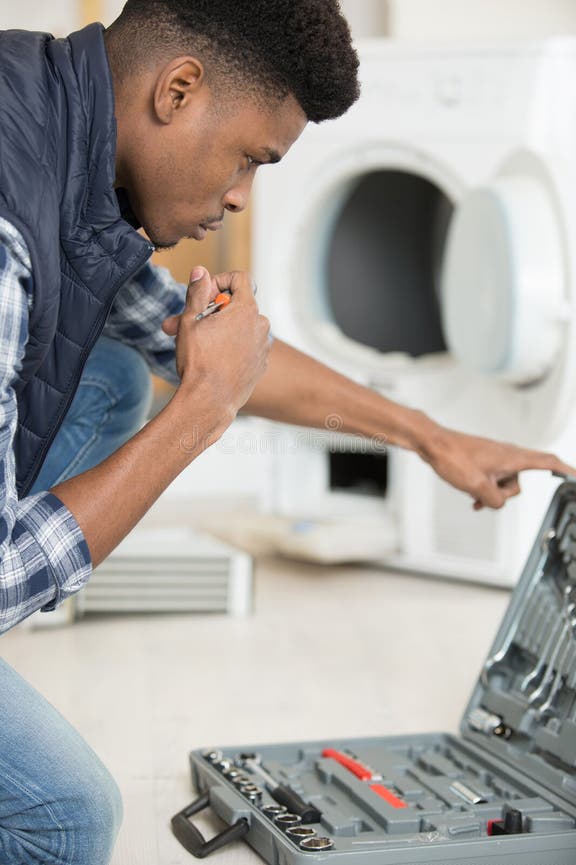 Washing Machine Engineer Looking at Toolkit Stock Image - Image of ...