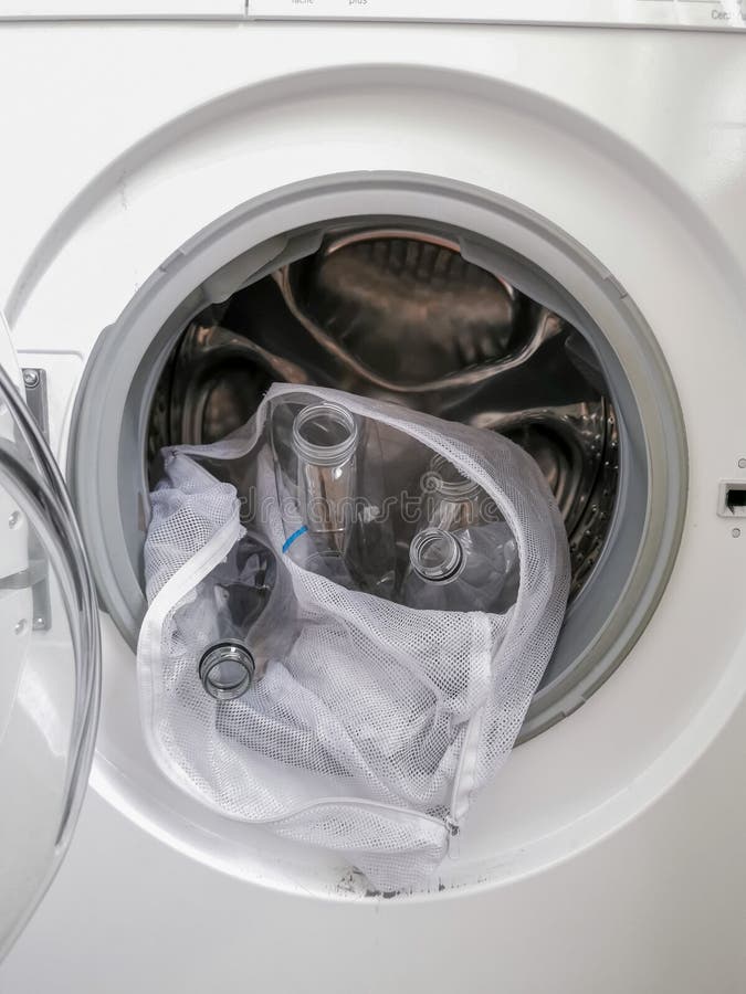 Washing Machine Filled with Plastic Bottles Representing Micro Plastic ...