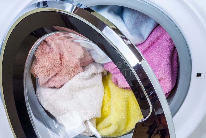 Washing Machine Full of Laundry Stock Photo - Image of clean, powder ...