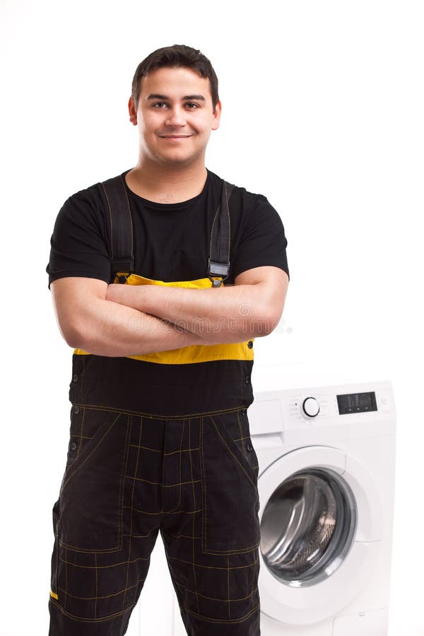 Washing machine repairman stock photo. Image of equipment - 31649500