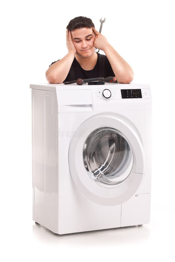 Washing machine repairman stock photo. Image of equipment - 31649500