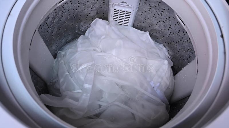 A Washing Machine that is Running with a Spin and Spin Stock Video ...