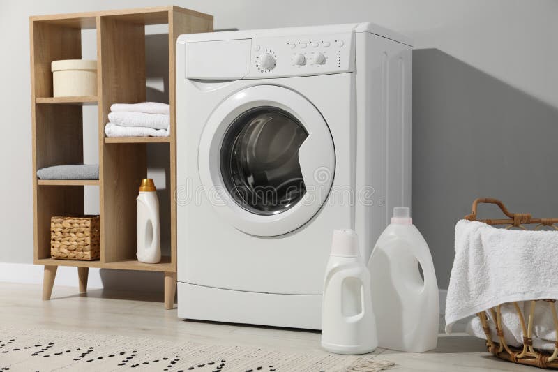 Washing Machine, Towels and Detergents in Laundry Room Stock Image ...