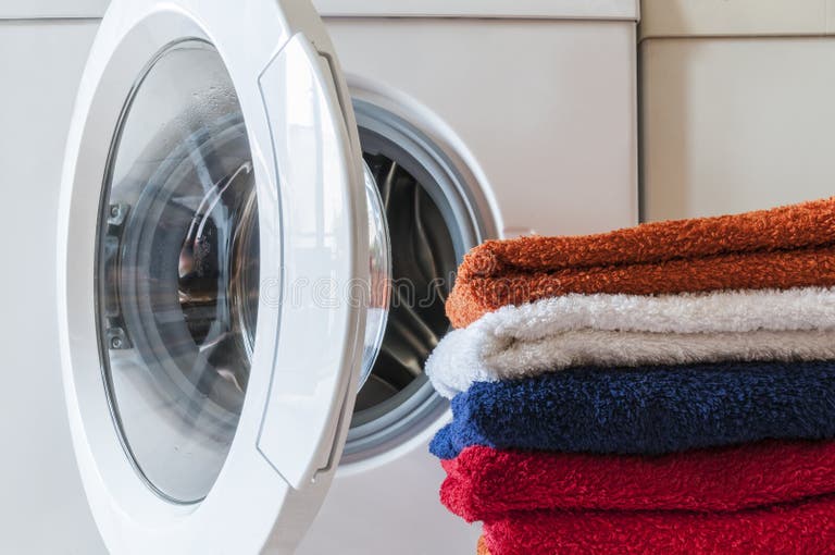 Washing machine and towels stock image. Image of clean - 163453763