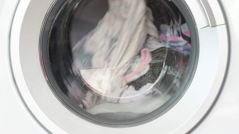 Washing Machine Working with Rotating Garments Inside, Process of ...