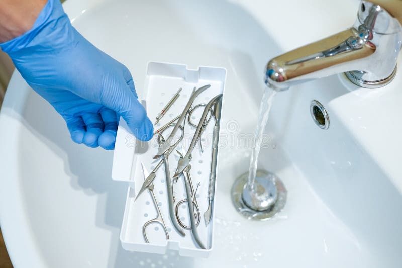 Washing Manicure Tools before Sterilization Stock Photo - Image of ...