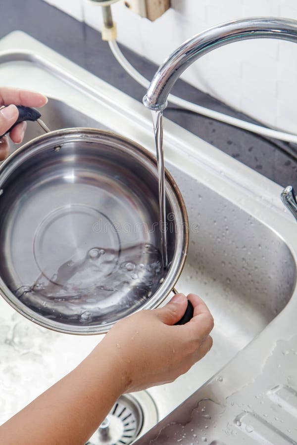 Washing Pans stock image. Image of lifestyle, drain, women - 70418579