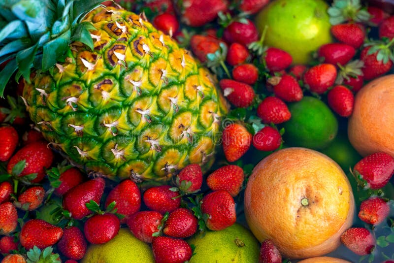 Washing Pineapple, Strawberries and Oranges Stock Image - Image of home ...