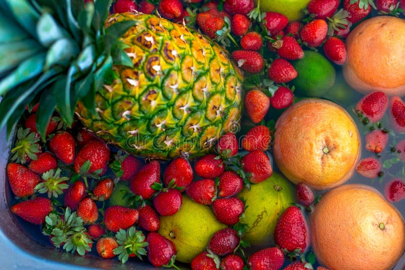 Washing Pineapple, Strawberries and Oranges Stock Image - Image of home ...