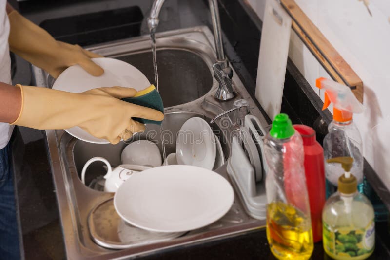Washing plates stock image. Image of sink, dishes, smiling - 89119867