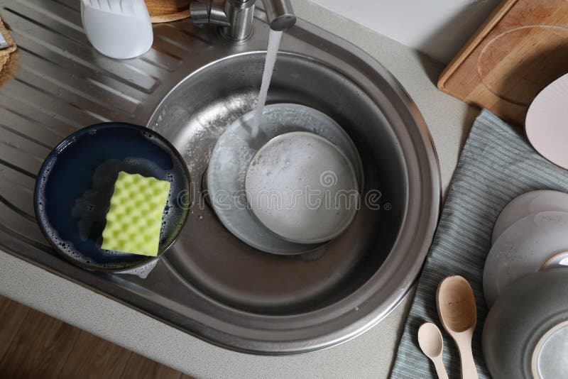 Washing Plates in Kitchen Sink, Above View Stock Image - Image of ...