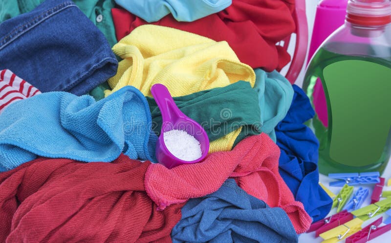 Washing Powder and a Pile of Dirty Laundry. Stock Photo - Image of ...