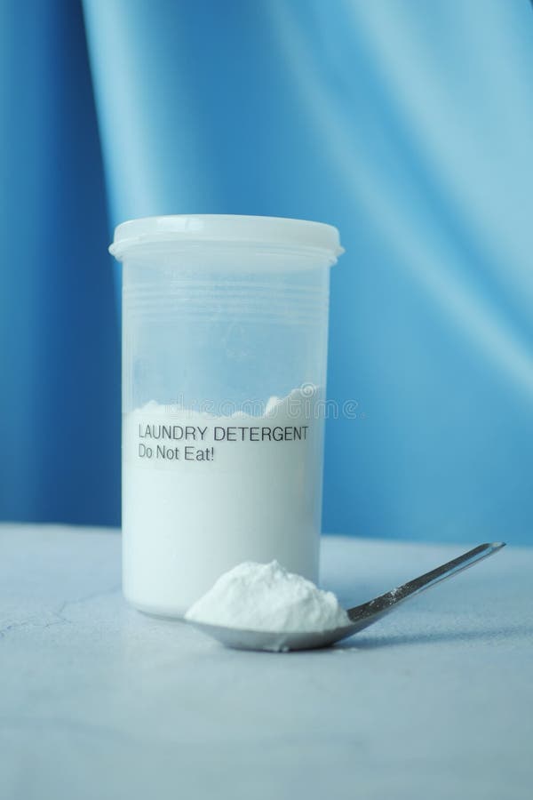 Washing Powder in Plastic Spoon and Container on Table Stock Image ...