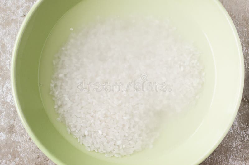 Washing the rice stock image. Image of cook, white, rice - 49727109