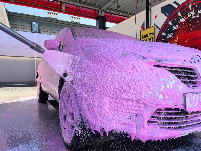 Washing a Silver Car Using Pink Active Foam at a Car Wash Stock Image ...