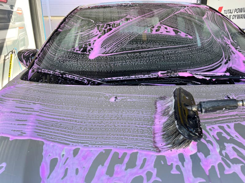 Washing a Silver Car Using Pink Active Foam at a Car Wash Stock Photo ...