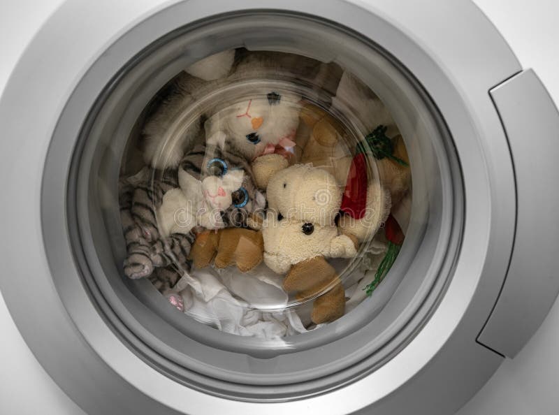 Washing Soft Toys in the Washing Machine. Stock Photo - Image of ...